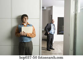 Employee hiding from the boss Stock Image | bcp037-51 | Fotosearch