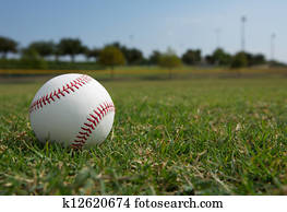 Baseball in the Outfield Grass Stock Image | k12620681 | Fotosearch