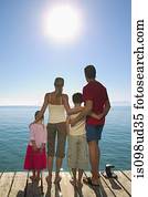 Family enjoying the sun Stock Photography | is052-085 | Fotosearch