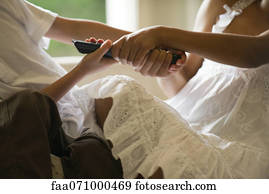 A brother and sister fighting over the remote control Picture ...