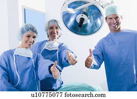 Medical personnel in operating room Picture | u12010374 | Fotosearch