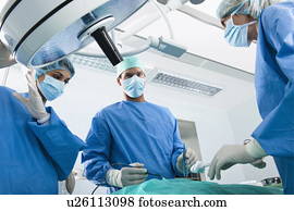 Medical personnel in operating room Picture | u12010374 | Fotosearch