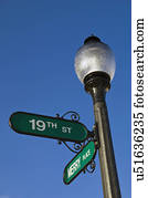 Lamp post and Bourbon Street sign in New Orleans Stock Image ...