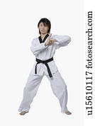 Female karate instructor teaching martial arts to a young woman Stock ...