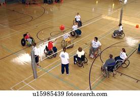 Several people with disabilities playing a game of wheelchair ...