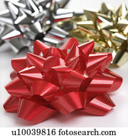 Still life of big red Christmas bow. Stock Image | u10047983 | Fotosearch